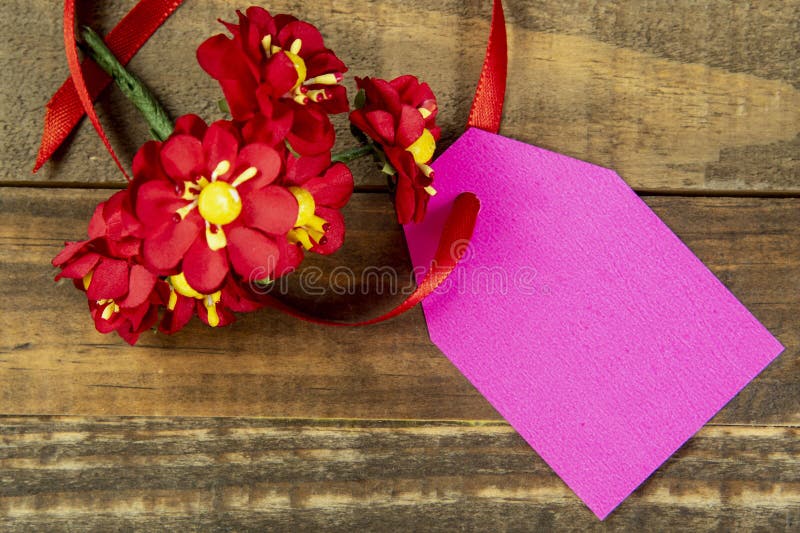 Decorative Christmas Elements Next To Card with Red Ribbon and Space To ...