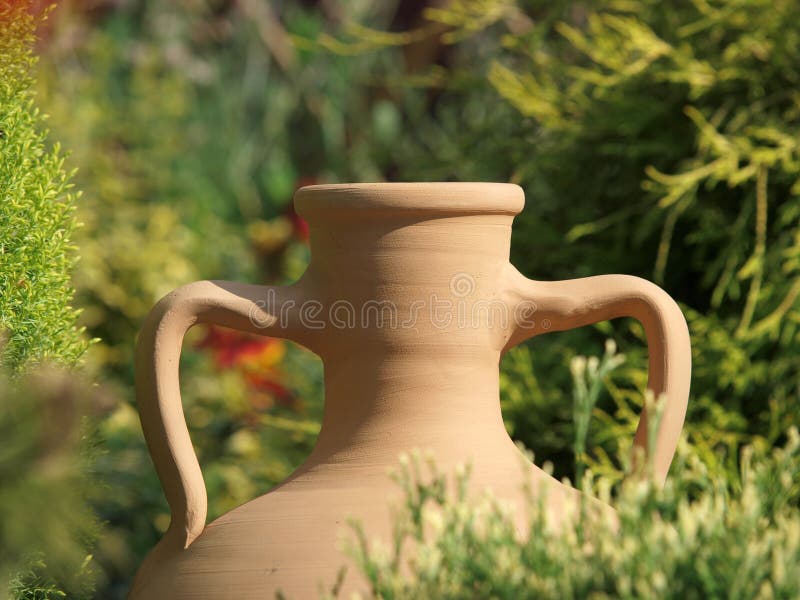 Decorative Clay Pot in Garden. Stock Photo - Image of grass, nature ...