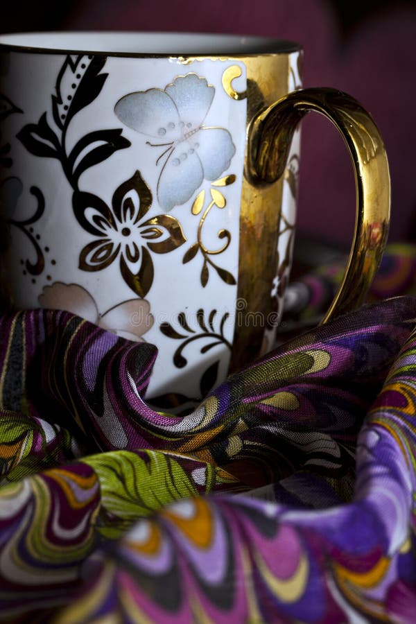 Decorative Coffee Cup on Colorful Fabric Stock Photo - Image of morning ...