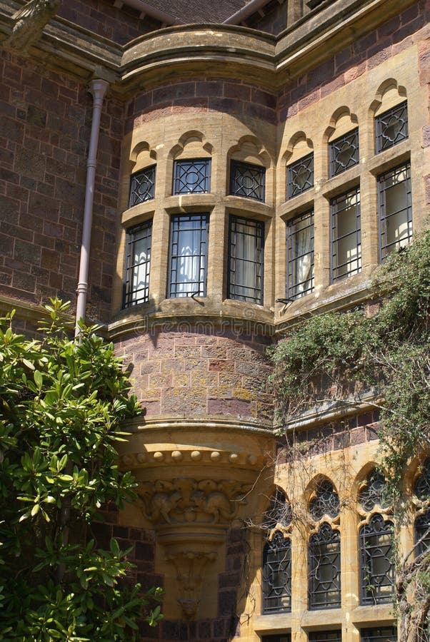 Decorative Corner Tudor Bay Window with Sculptures Stock Image - Image ...