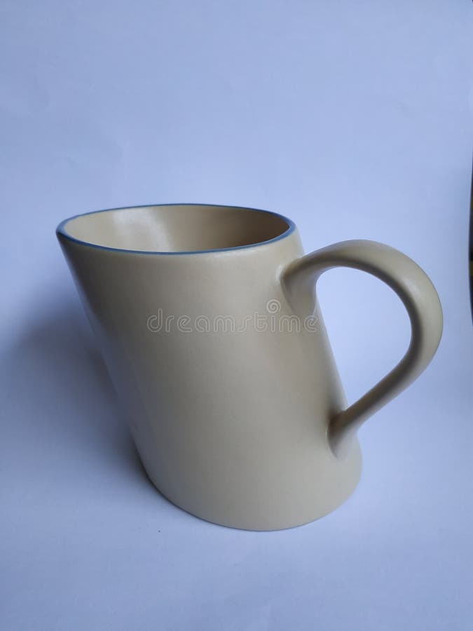 Decorative Cup Made of Porcelain that is Tilted in Light Brown Color ...