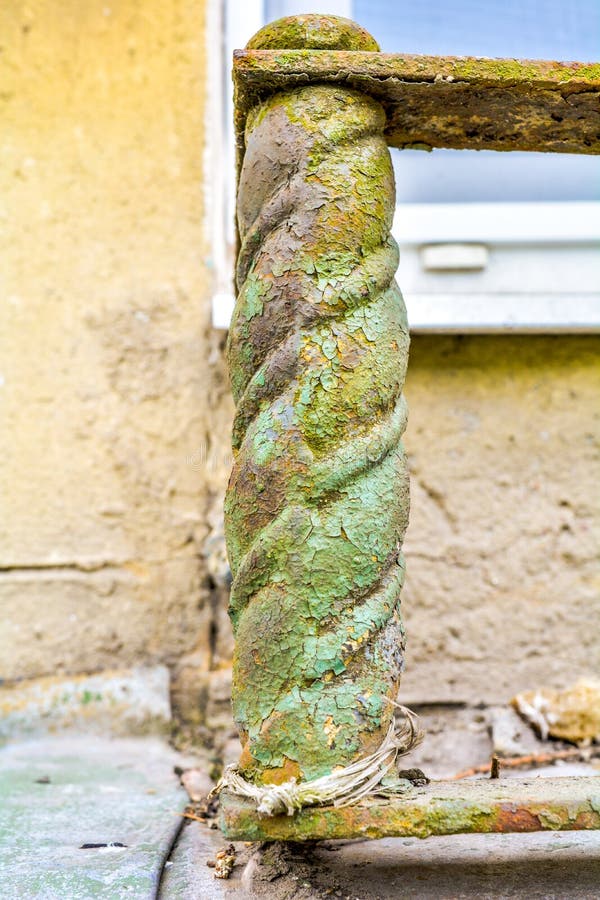 Decorative Building Detail Rusty Cast-iron Twisted Post from Window ...