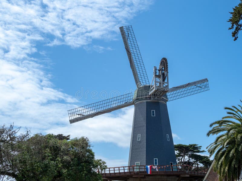 A Dutch Windmill with Clouds Moving To the Left Stock Image - Image of ...