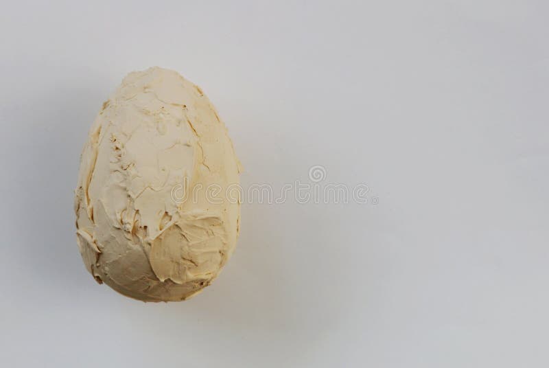 Decorative Egg Covered with Plaster on the Background. Stock Image ...