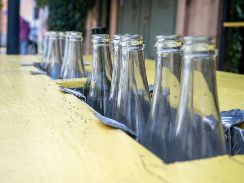 Decorative Empty Bottles. Table at the Bar on the Street Stock Image ...