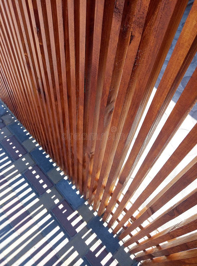 Decorative Fence and Its Shadow on a Sunny Day. Stock Photo - Image of ...