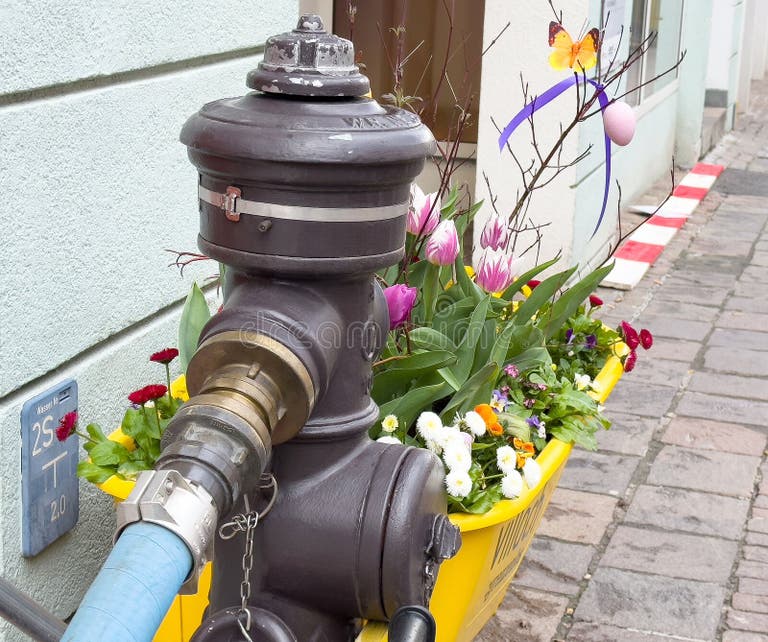 Decorative Fire Hydrant with Spring Flowers and Easter Decorations in ...