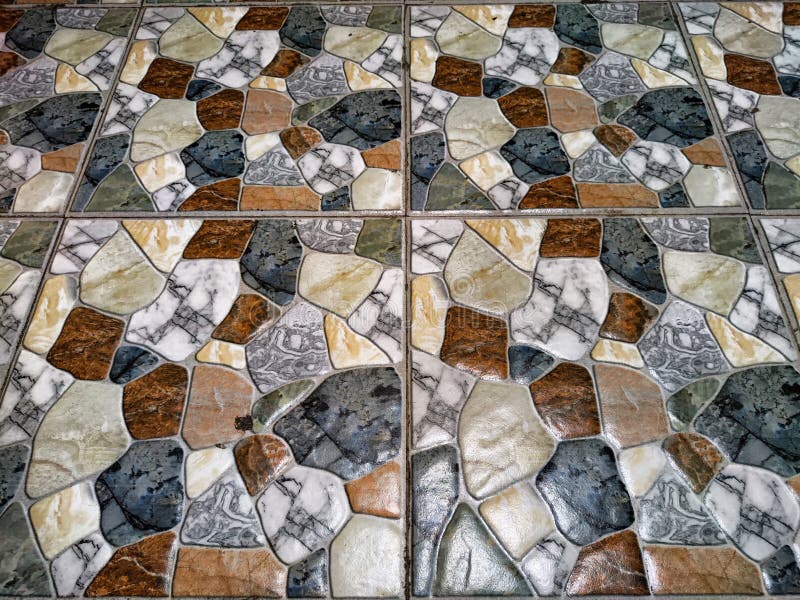 Decorative Floor Tiles Featuring a Mix of Colors and Patterns Suitable ...