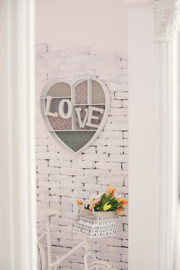 Decorative Frame with an Inscription Love on a Wall Stock Image - Image ...