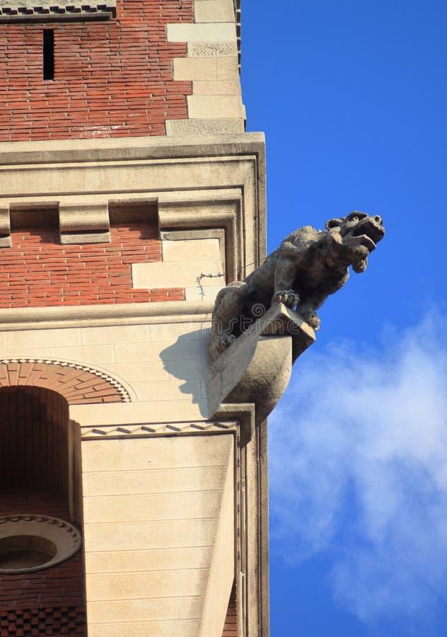 Decorative Gargoyle on the Facade of a Stately Red Brick Building ...