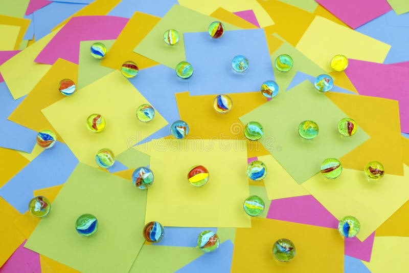 Decorative Glass Balls on a Background of Multicolored Paper Sticky ...