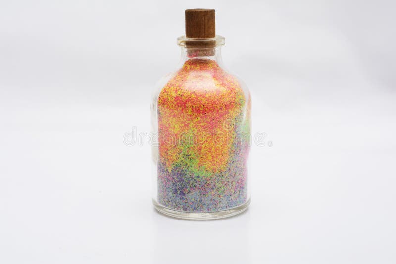 Decorative Glass Bottle with Colorful Sand on White Stock Photo - Image ...