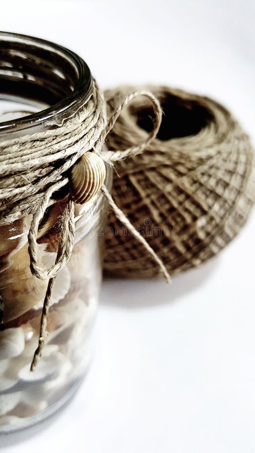 Decorative Glass Jar with Seashells and Hemp String Stock Image - Image ...