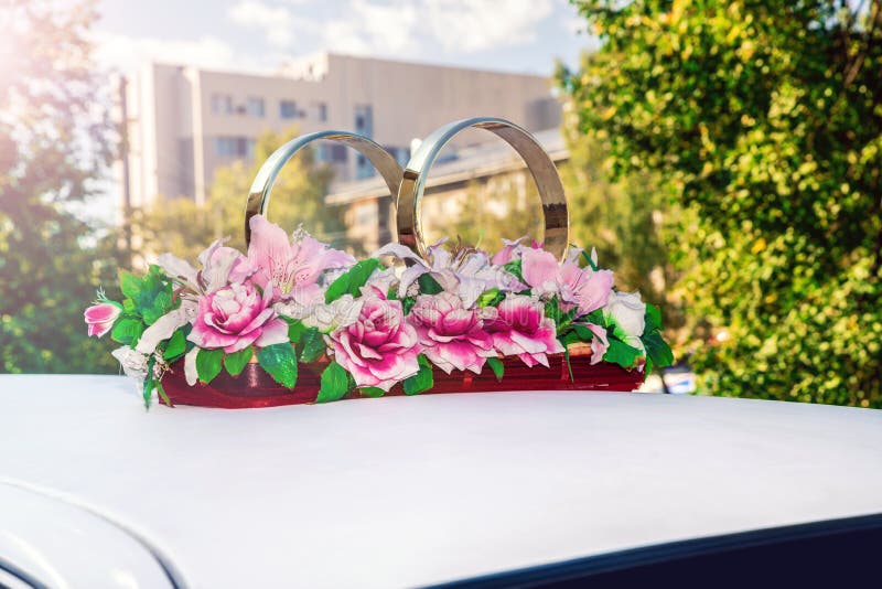 Decorative Gold Rings at the Wedding on a White Car Stock Image - Image ...