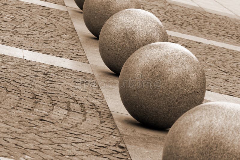 Decorative Granite Balls on a Pavement Stock Image - Image of balls ...