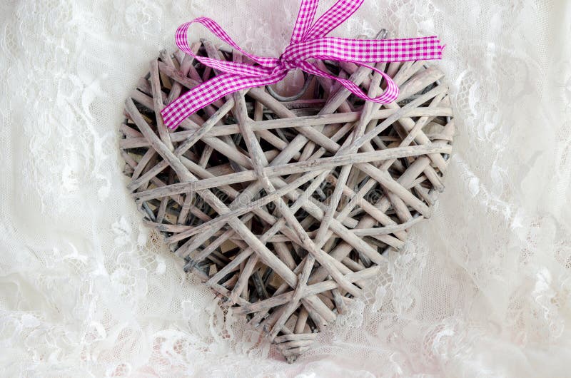 Decorative Handmade Heart Made of Wood on White Laces Stock Image ...