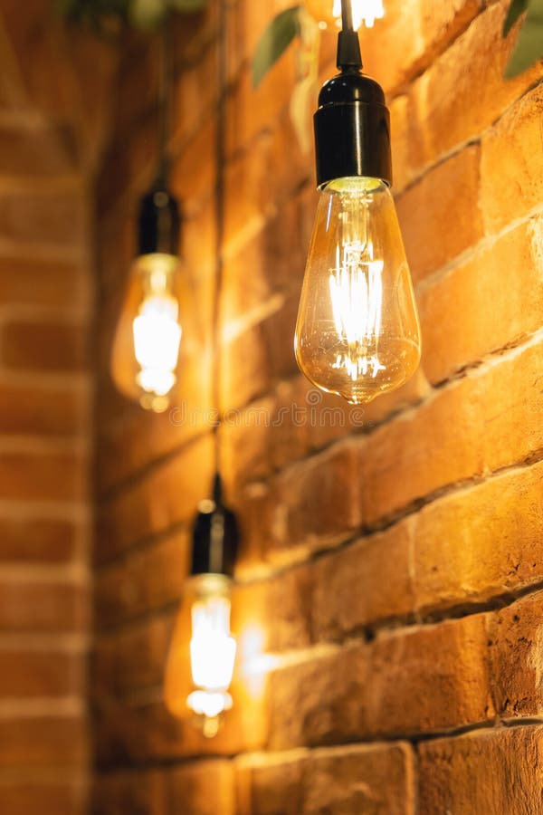 Decorative Incandescent Bulbs in Edison Style on a Brick Wall ...