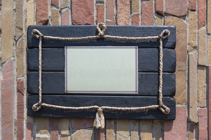 Decorative Information Plaque on a Stone Wall Stock Image - Image of ...
