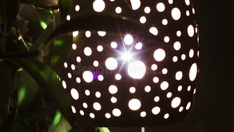 Decorative lamp with holes stock footage. Video of illumination - 61814628