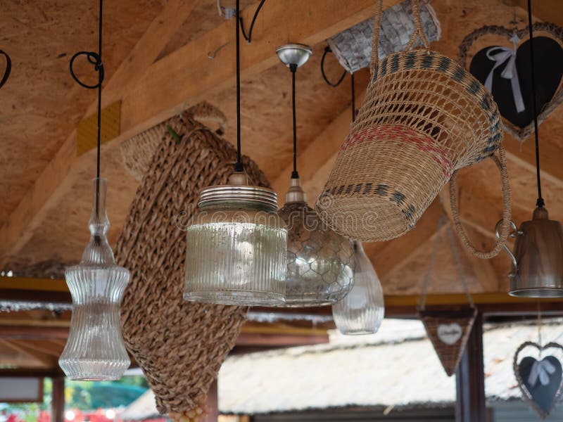 Decorative Lamps and Baskets Hang on the Ceiling Stock Image - Image of ...