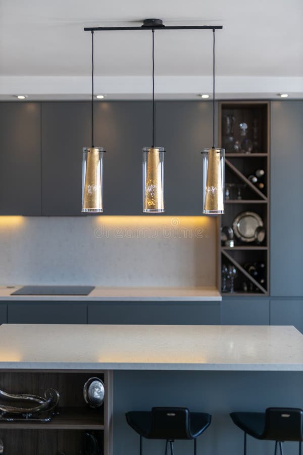 Decorative Lamps Hanging Over Kitchen Island Table Stock Image - Image ...