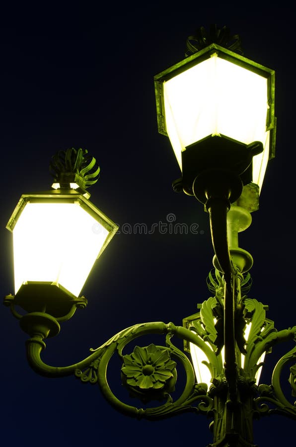 Decorative lit lamp post stock photo. Image of bright - 28955700