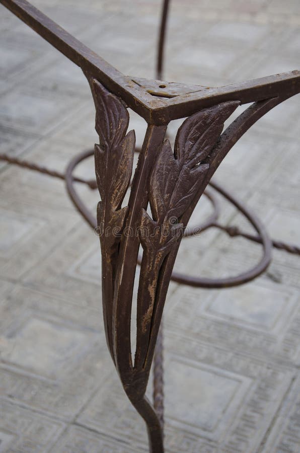 Decorative Metal Elements on the Legs of the Table Stock Photo - Image ...