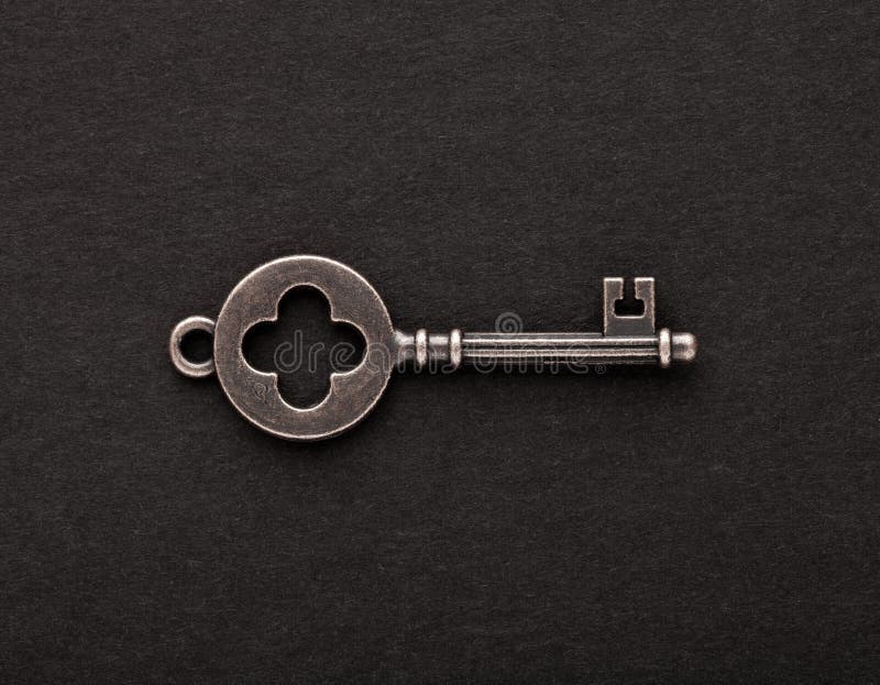 Decorative Metal Key on the Empty Black Background Stock Photo - Image ...