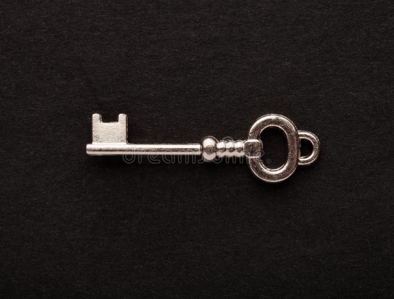 Decorative Metal Key on the Empty Black Background Stock Image - Image ...