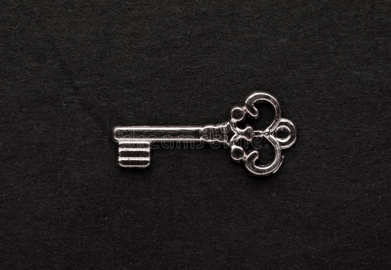 Decorative Metal Key on the Empty Black Background Stock Photo - Image ...