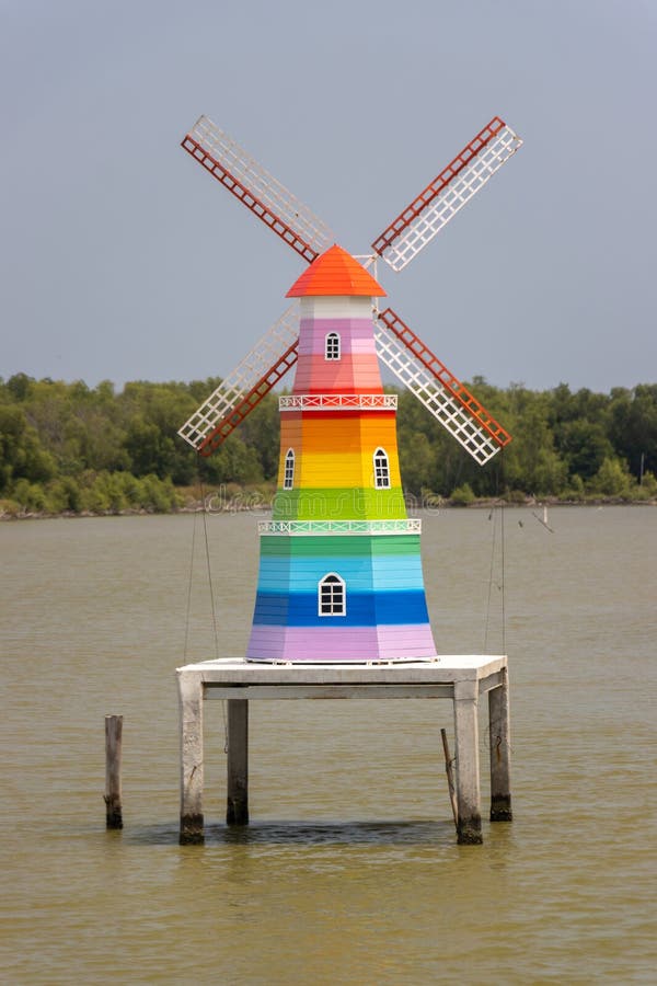 Decorative Model of a Windmill Standing by a Wooden Structure Over ...