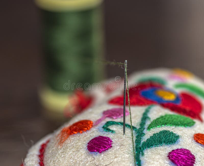 Decorative Needlepoint with Patterns Made of Felt and Threaded Sewing ...