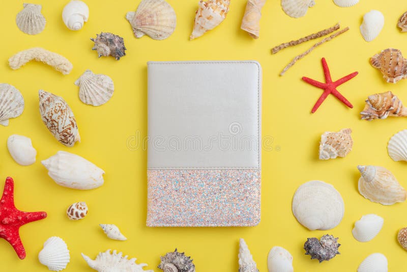 Decorative Notebook on the Table Surrounded by Shells and Starfish with ...