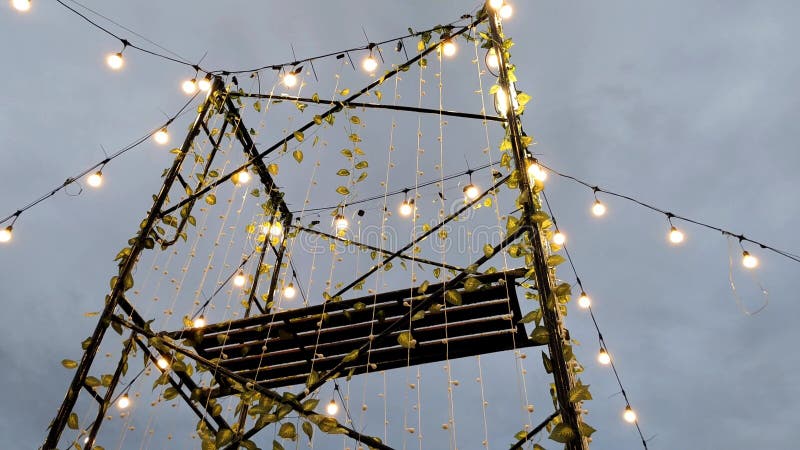 Decorative Outdoor Lighting with String Bulbs on Wooden Structure at ...