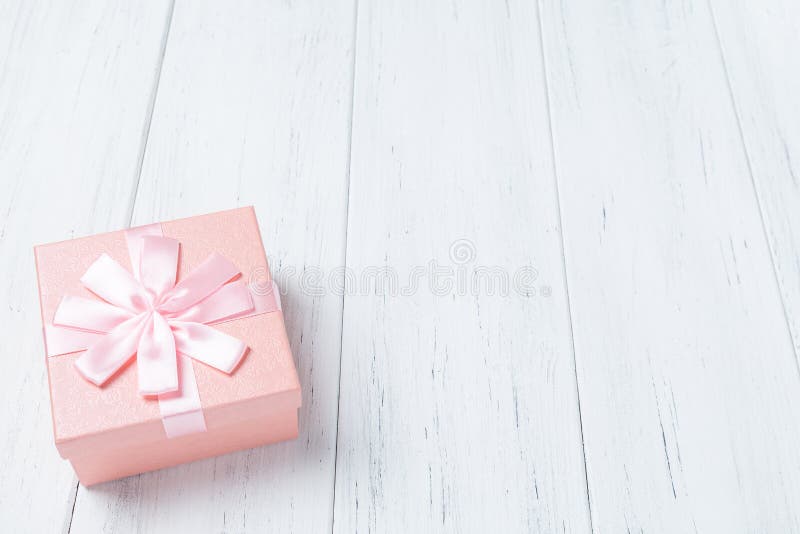Decorative Pink Gift Box with Bow on Wooden Table Stock Image - Image ...