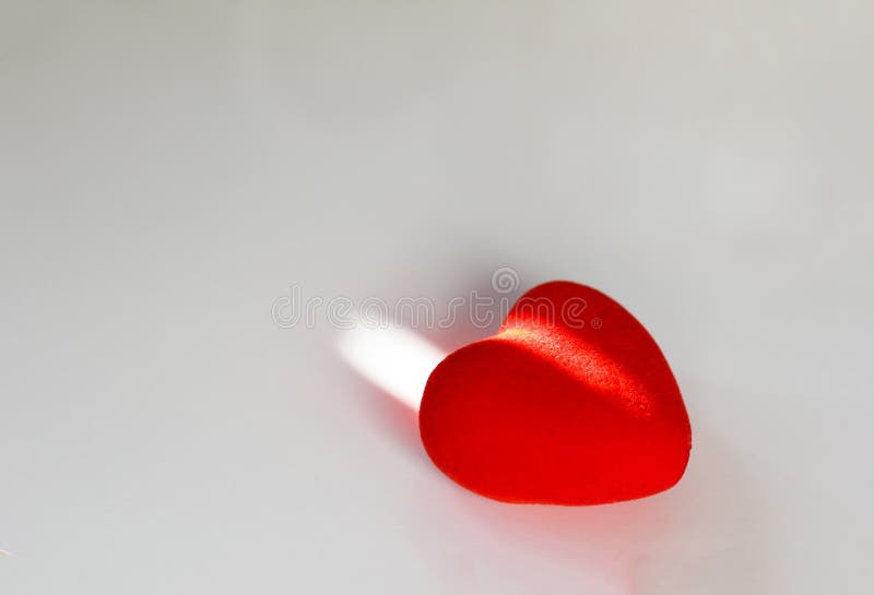 Decorative Red Heart on a White Background with Sun Rays and Shadow ...