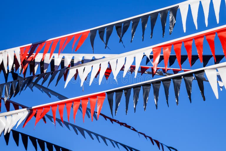 Decorative Red, White and Black Plastic Bunting Flags Stock Image ...
