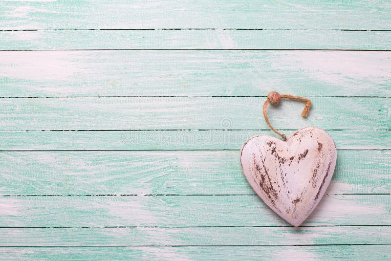 Decorative Rustic Heart on Turquoise Painted Wooden Background Stock ...