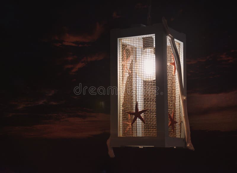 Decorative Sailor Lamp with Marin Objects Hanging from a Tree Stock ...