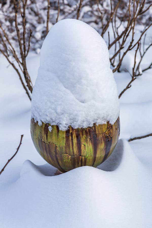 The Decorative Column in the Garden is Covered with Snow Stock Image ...
