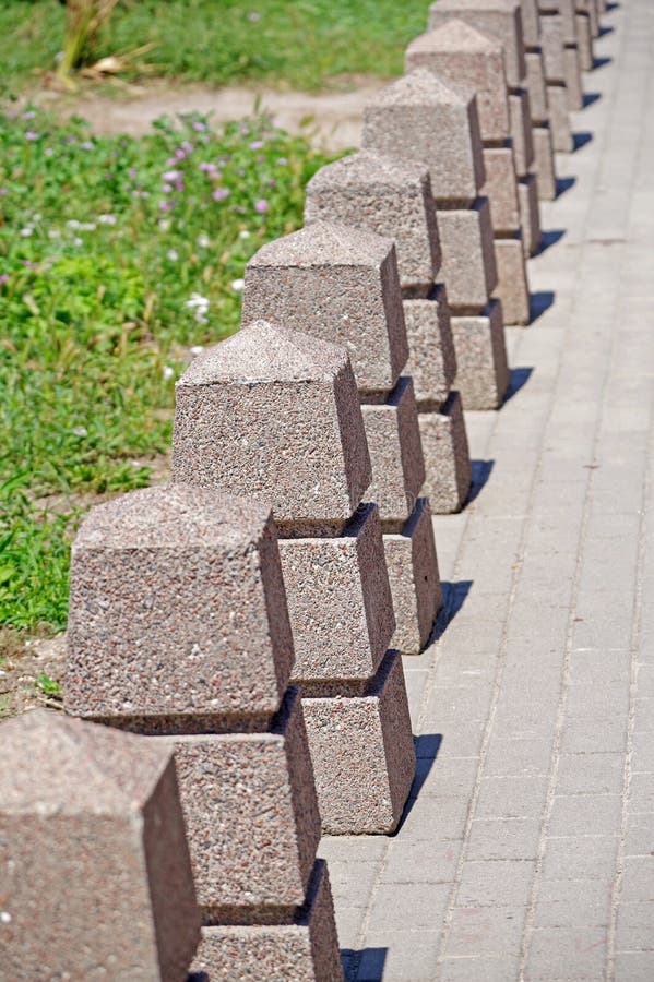 Decorative stone posts stock image. Image of pavement - 225165913