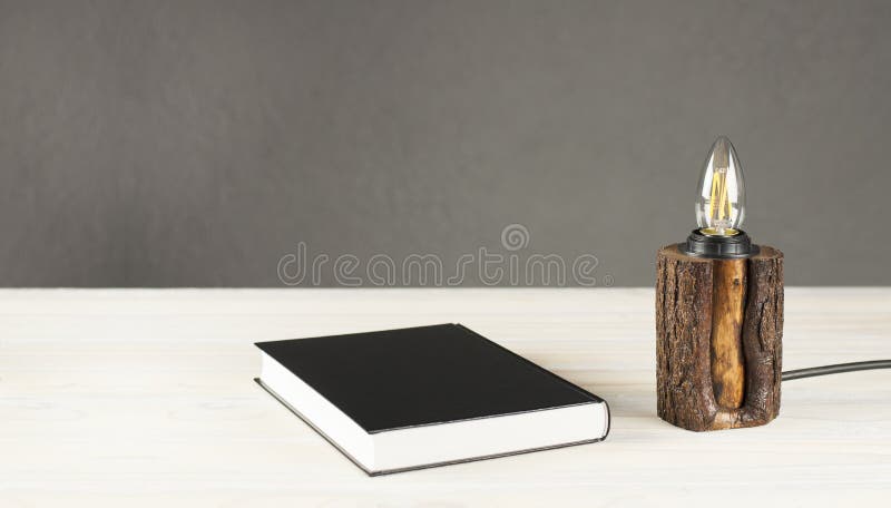 Decorative Table Lamp in Loft Style. Design. There is a Notebook on the ...