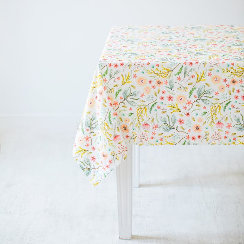 Decorative Tablecloth with Floral Patterns on a Table on a White ...