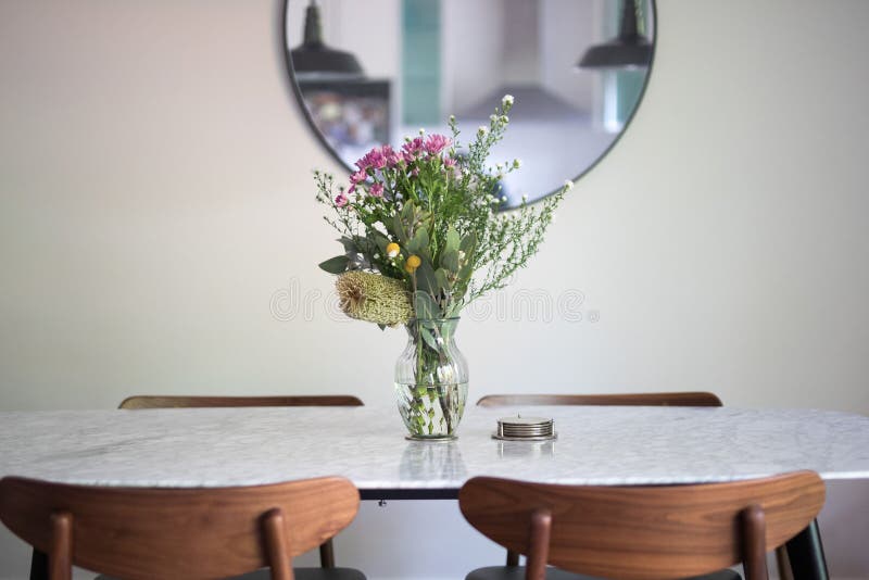 Decorative Vase with a Floral Bouquet on an Empty Dining Table Stock ...