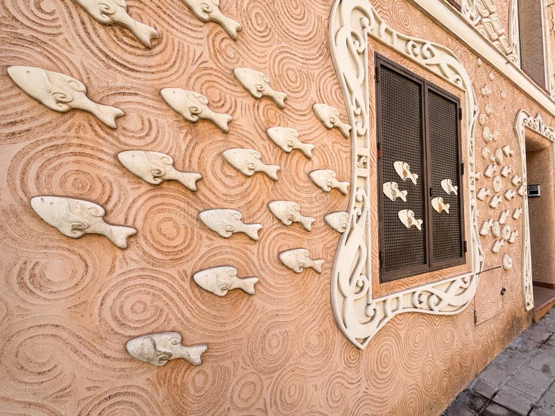 Decorative Wall Art Featuring Fish Sculptures Swimming in a Wavy ...