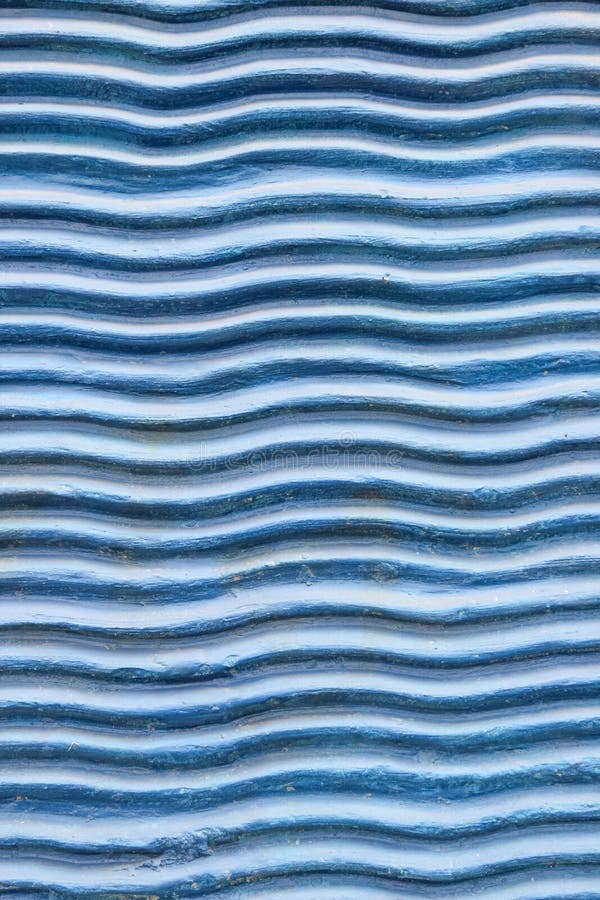 A Decorative Wall with a Wavy Structure Painted in Blue Stock Image ...