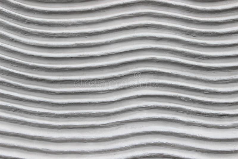 A Decorative Wall with a Wavy Structure Painted in Gray Stock Photo ...