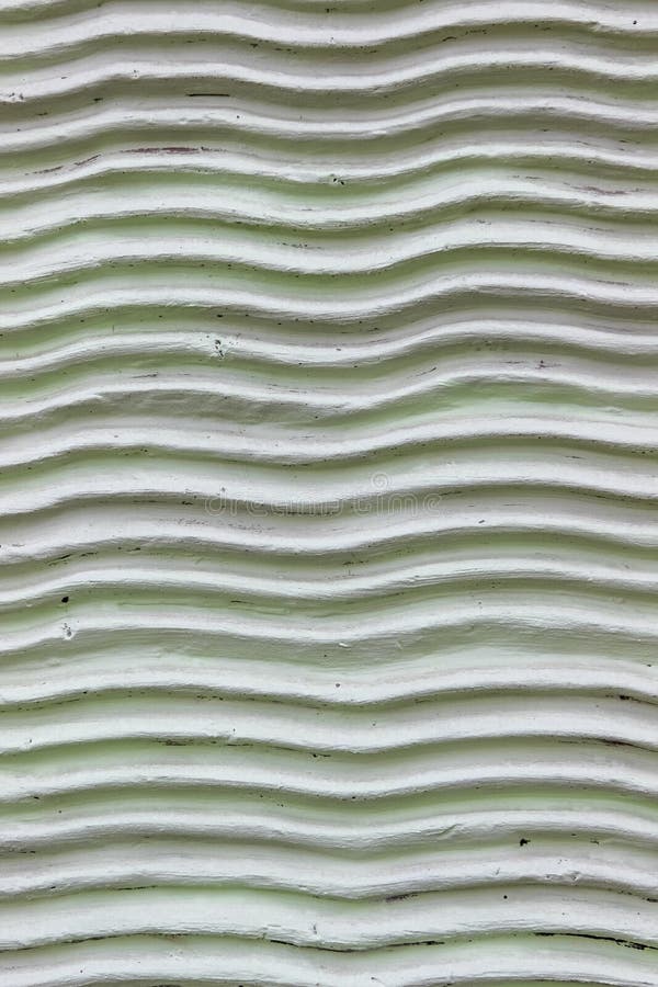 A Decorative Wall with a Wavy Structure Painted in Light-green Stock ...