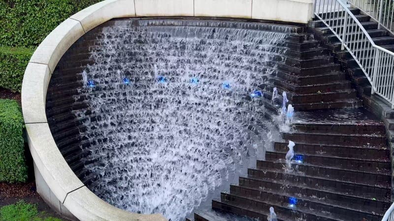 Decorative Waterfall with Steps and Plants in the City Center Stock ...