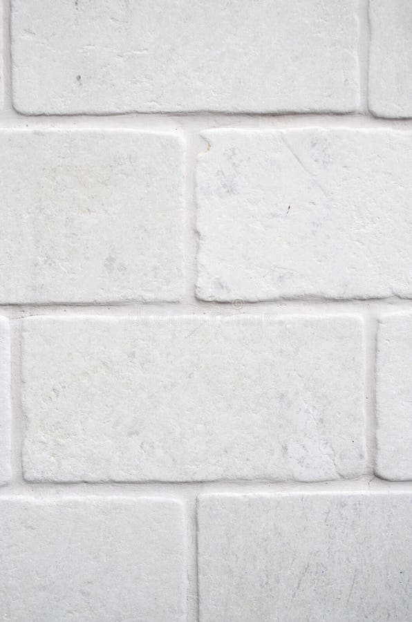 White Cladding Wall Made of Stoneware with Interlocking Tiles ...